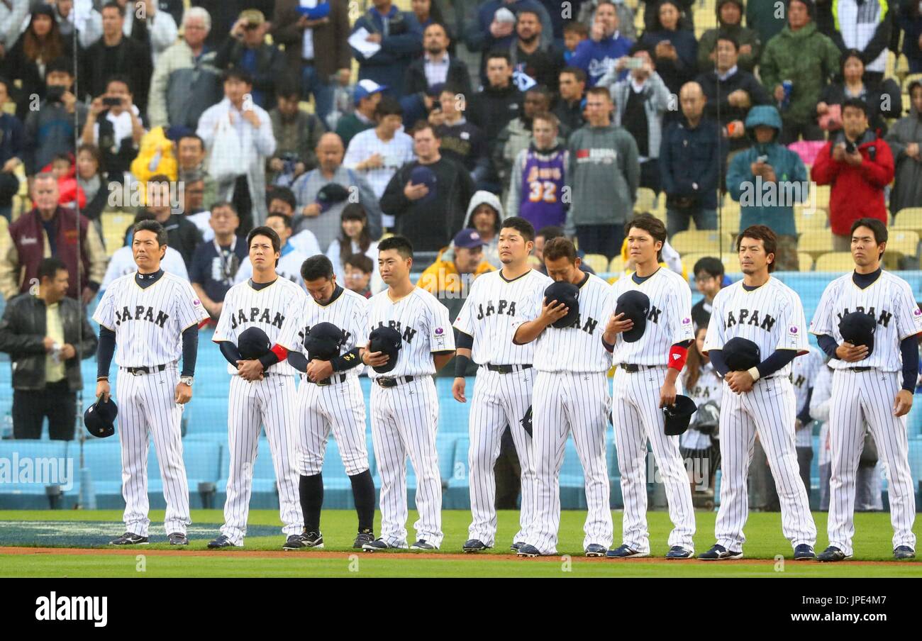 Hiroki Kokubo (far L), manager of Japan's World Baseball Classic team ...
