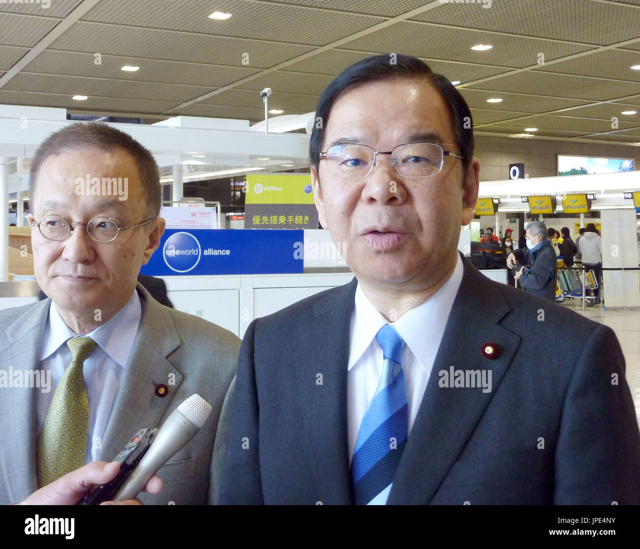 Japanese Communist Party leader Kazuo Shii (R) meets with reporters at ...