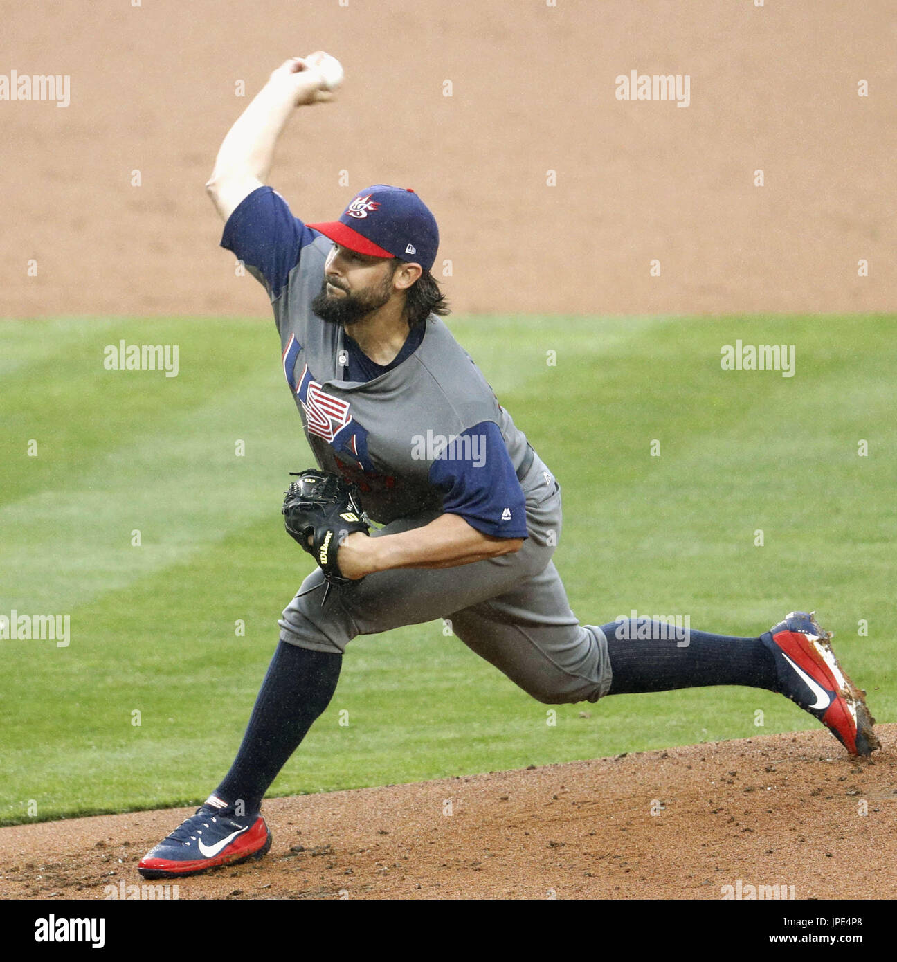 Tanner Roark of the United States pitches against Japan in their World ...