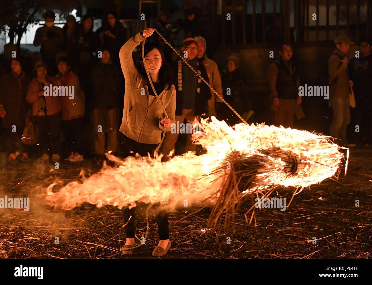 People swing torches at Aso Shrine in the southwestern Japan city of ...