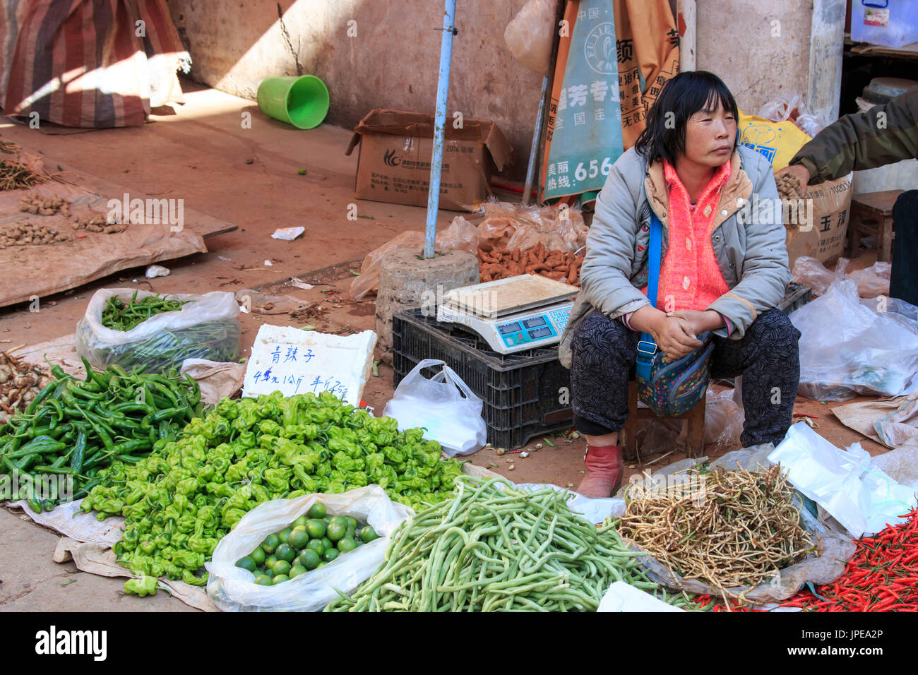 People selling and buying in a traditional market in the center of ...
