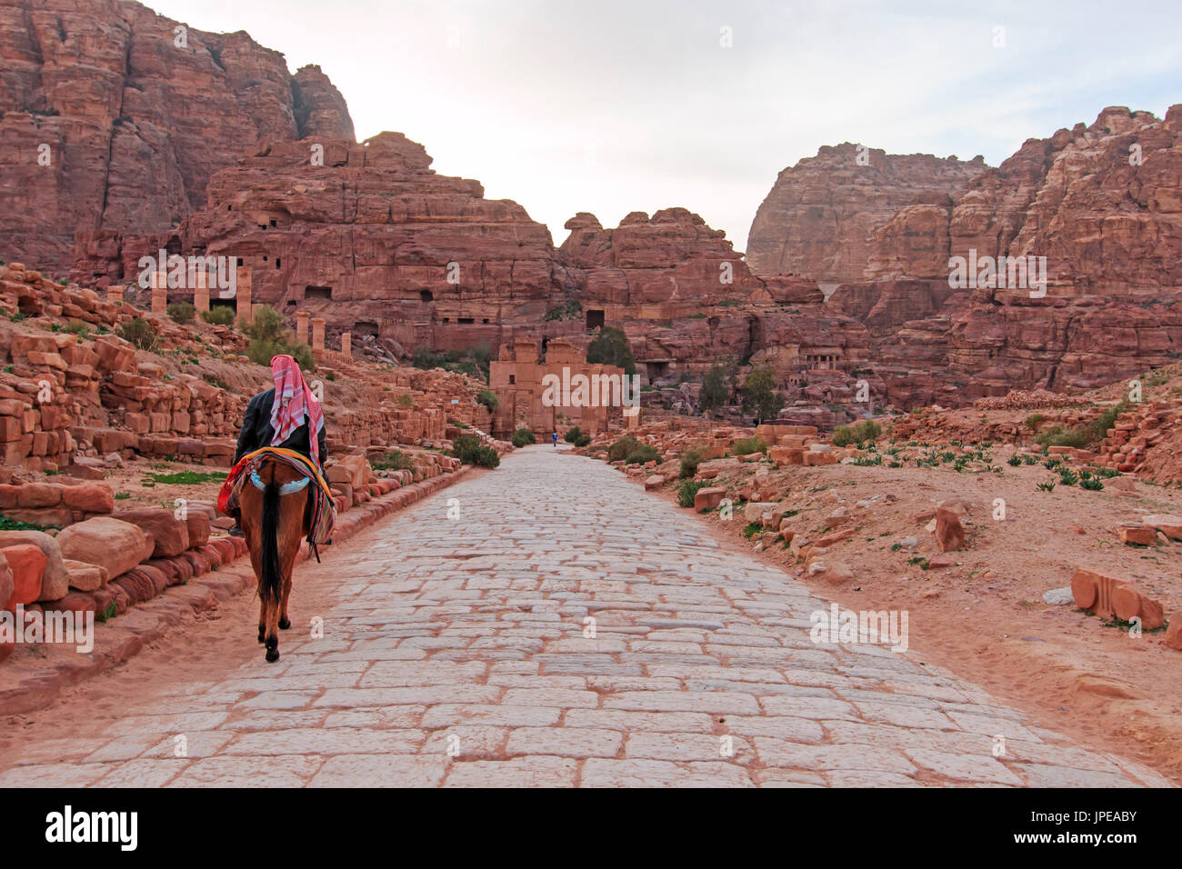 Tourist exploring the ruins of ancient Petra, Jordan Stock Photo - Alamy Tourist exploring the ruins of ancient Petra, Jordan Stock Photo - Alamy