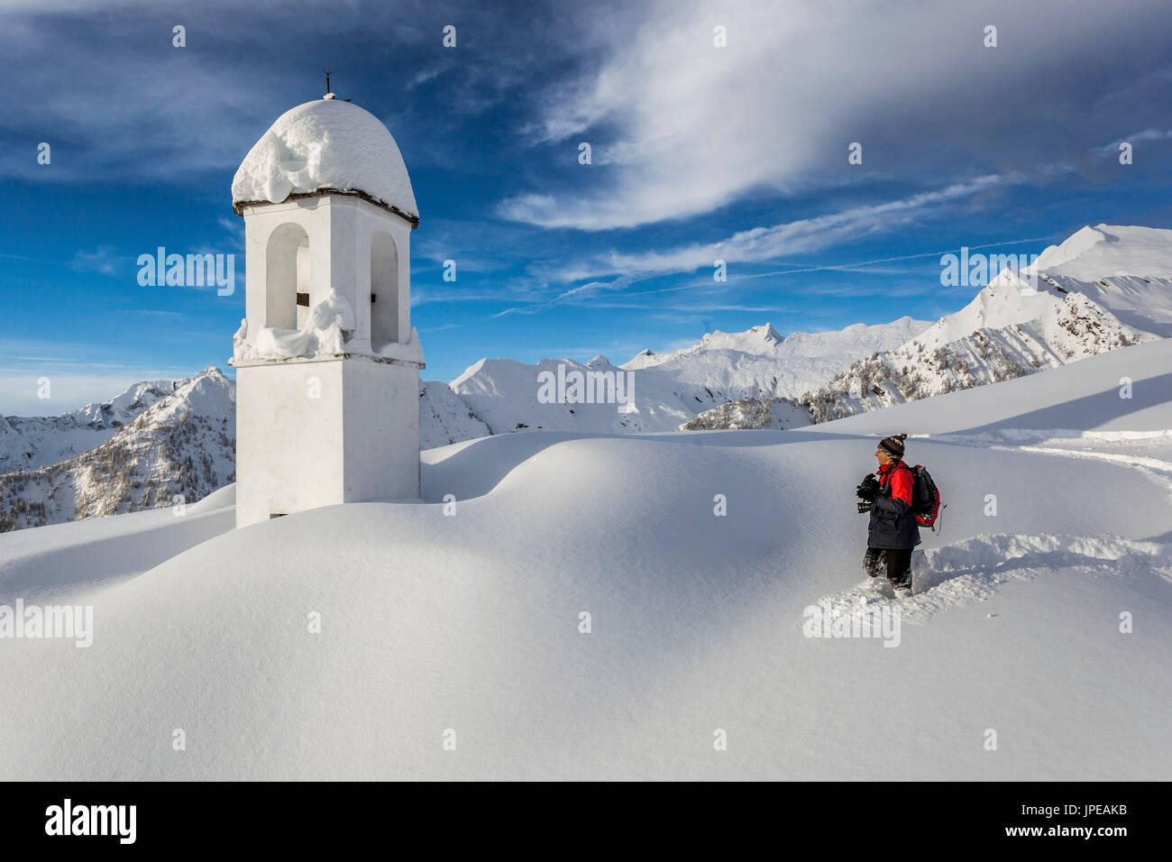 Italy, Italian Alps, Lombardy, The huts and the bell tower of Alpe Cima ...