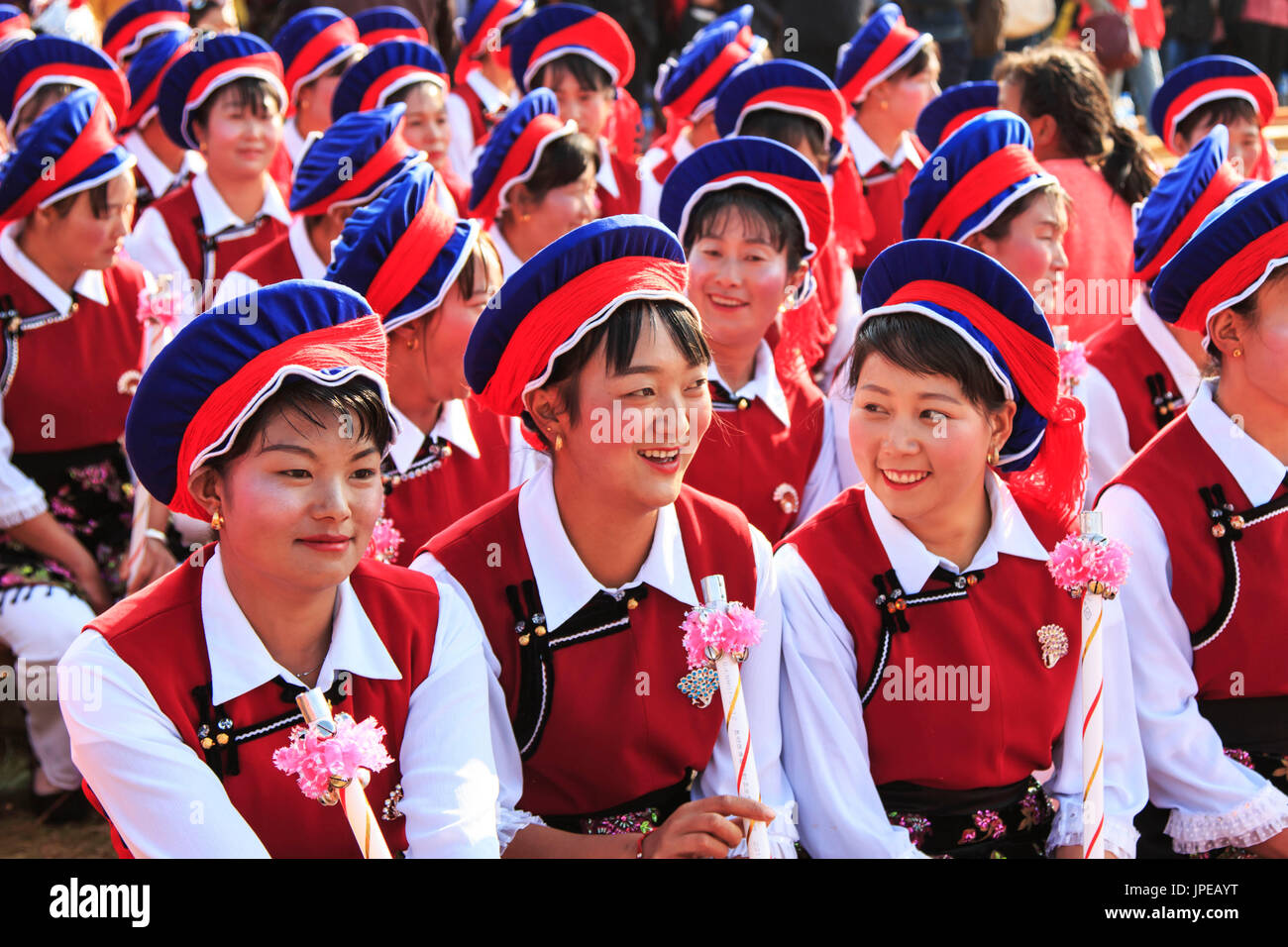 Chinese Girl In Traditional Bai Clothing During The Heqing Qifeng Pear chinese-girl-in-traditional-bai-clothing-during-the-heqing-qifeng-pear