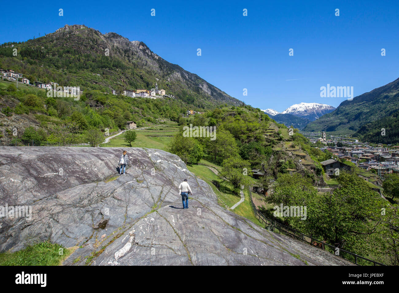 Tourists on Rupe Magna in search of petroglyphs in testimony of the ...