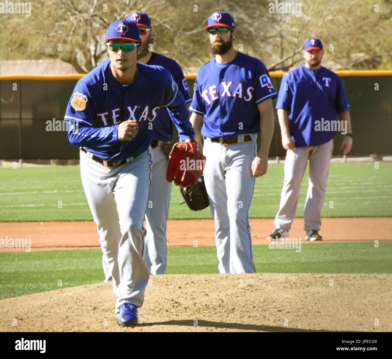 Texas Rangers pitcher Yu Darvish plays catch at the team's spring ...