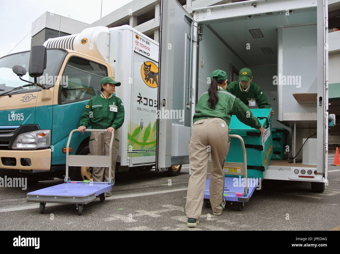 Photo taken in March 2013 shows Yamato Transport Co. delivery service ...