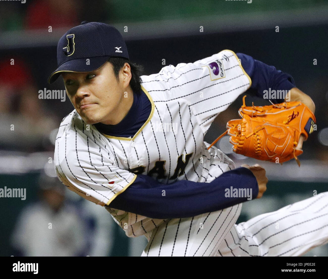 Japanese pitcher Takahiro Norimoto starts in Game 1 of a two-game World ...