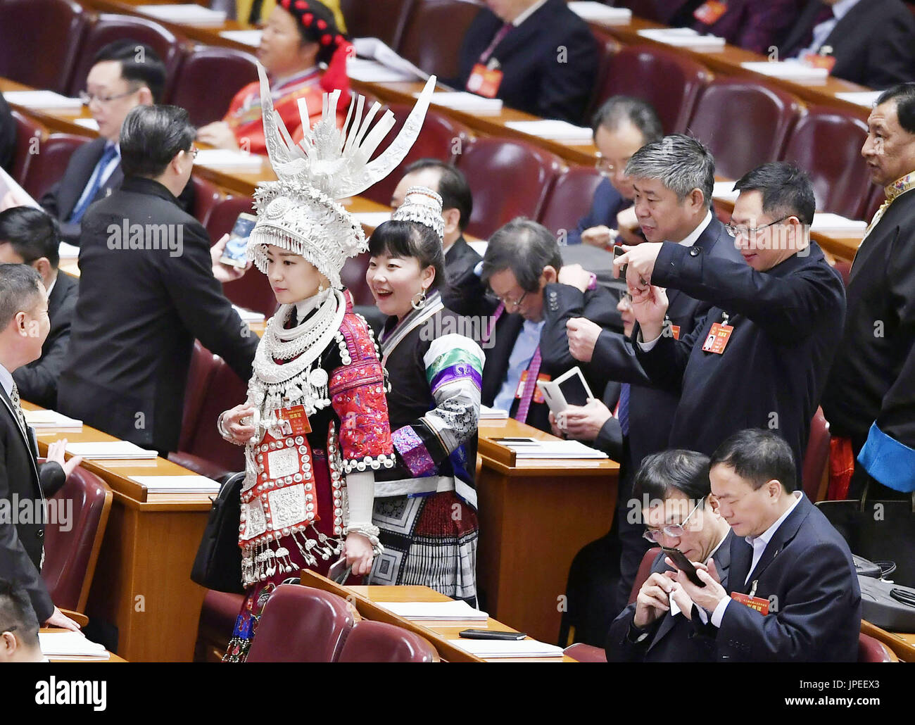 Representatives of an ethnic minority attend the National People's ...