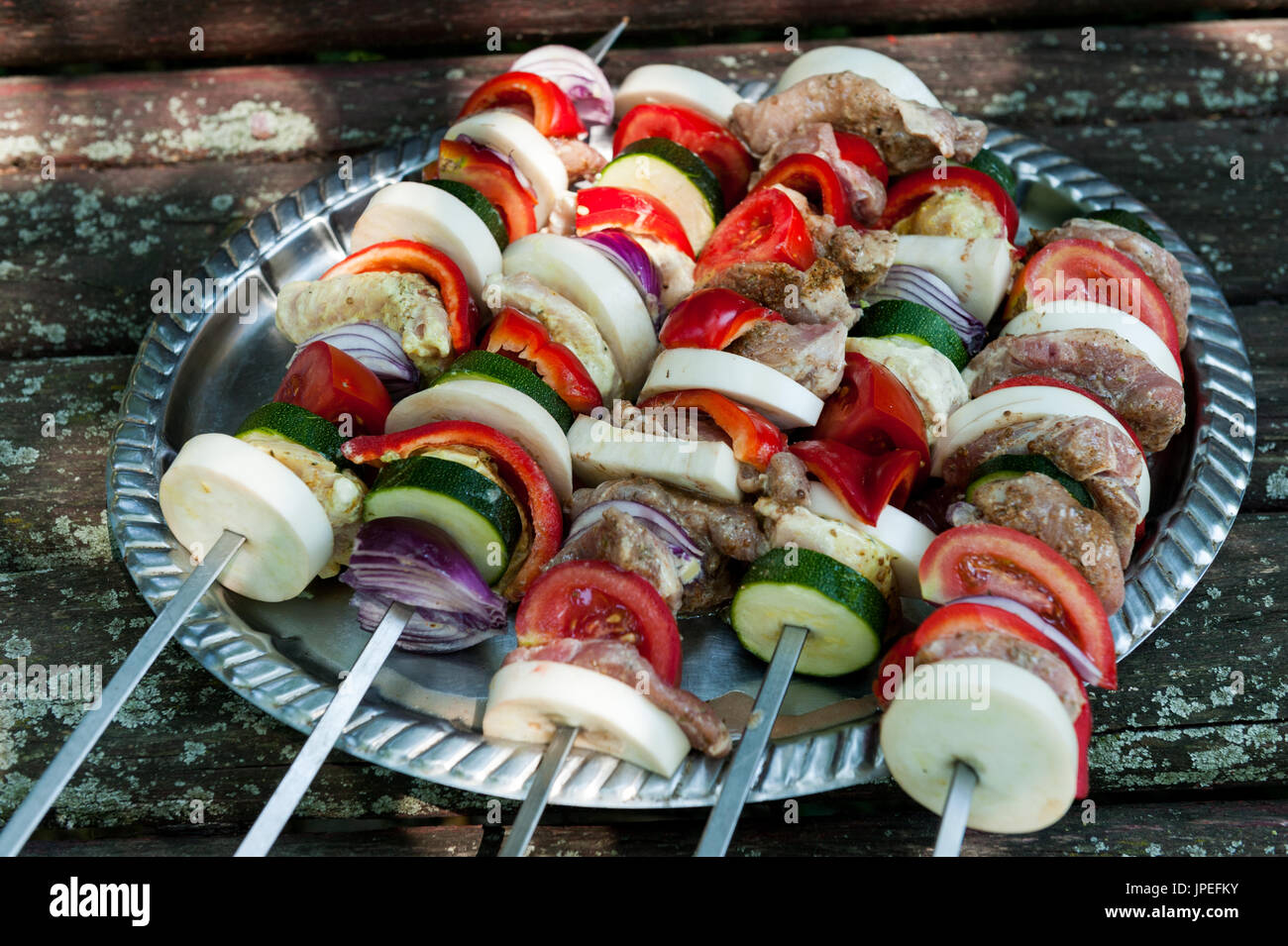 Meat and vegetable skewers for a party Stock Photo - Alamy