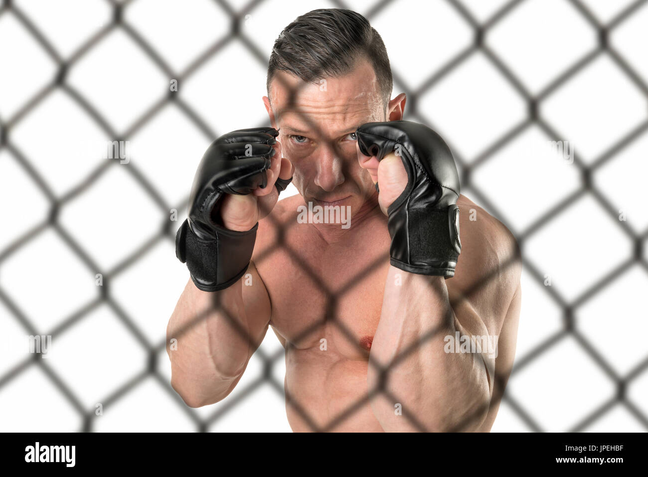 Strong Mixed Martial Arts fighter isolated in white Stock Photo - Alamy
