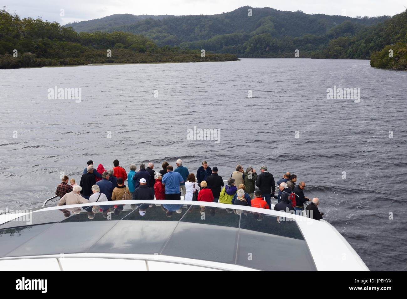 Tourists standing in bow of MV Lady Jane Franklin II on Gordon River ...