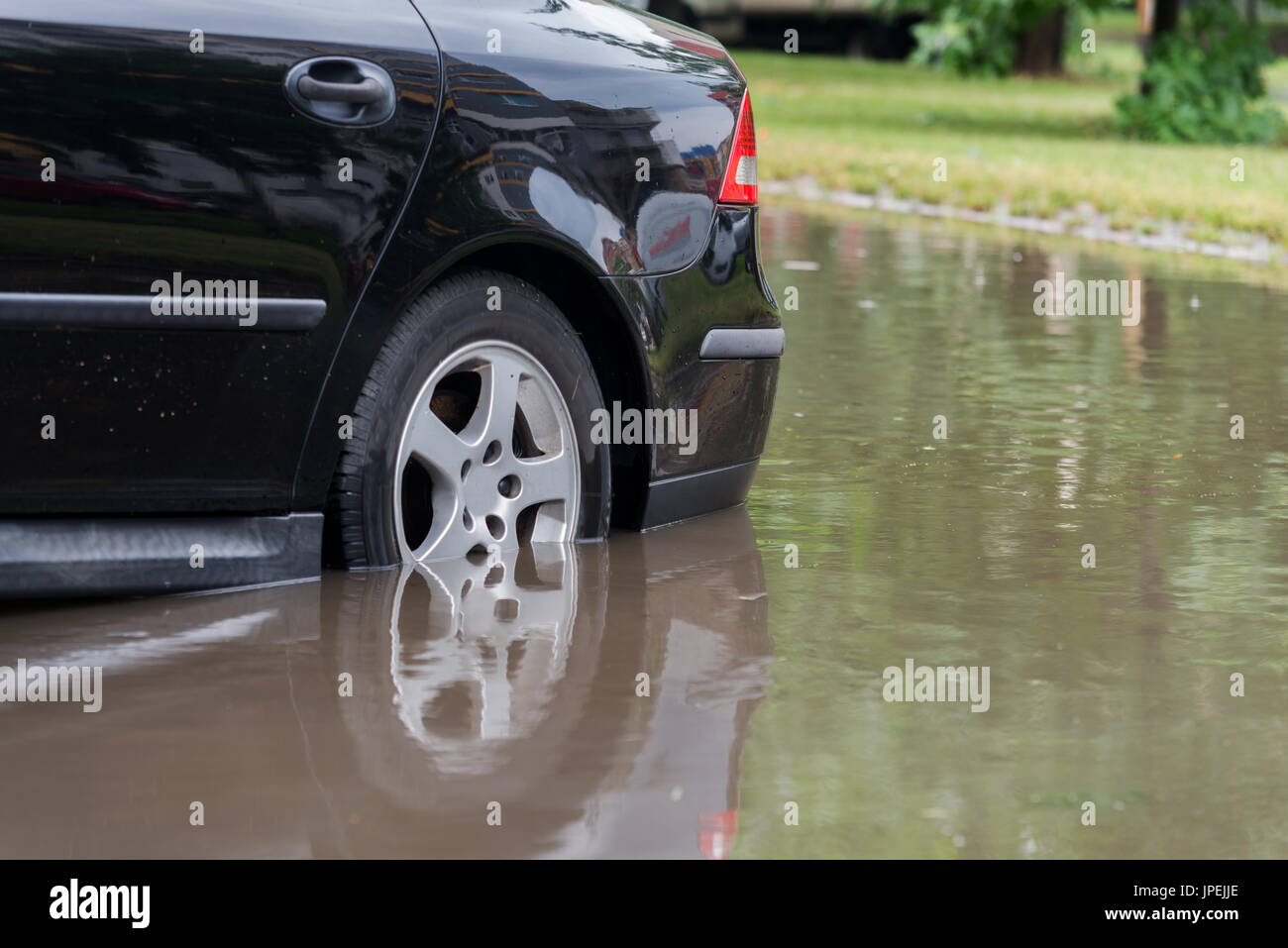 car in water after heavy rain and flood Stock Photo - Alamy