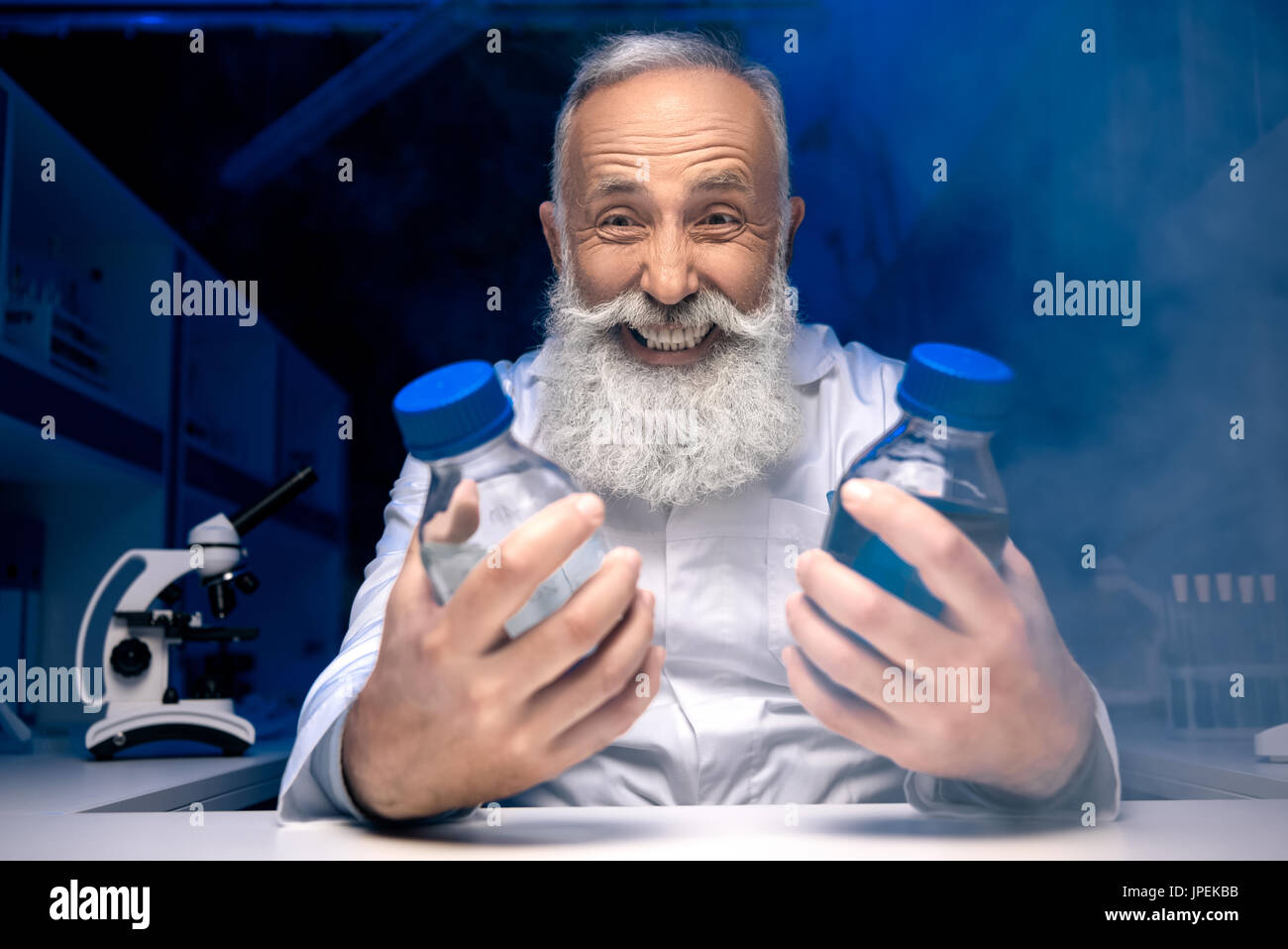 Happy scientist hi-res stock photography and images - Alamy