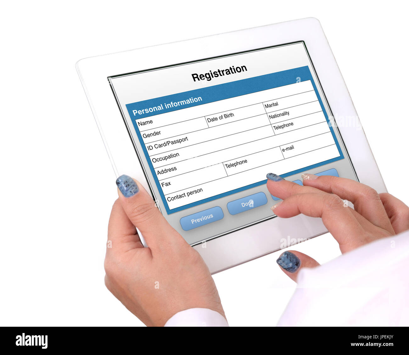 Someone's hands holding tablet that showed registration online form on ...