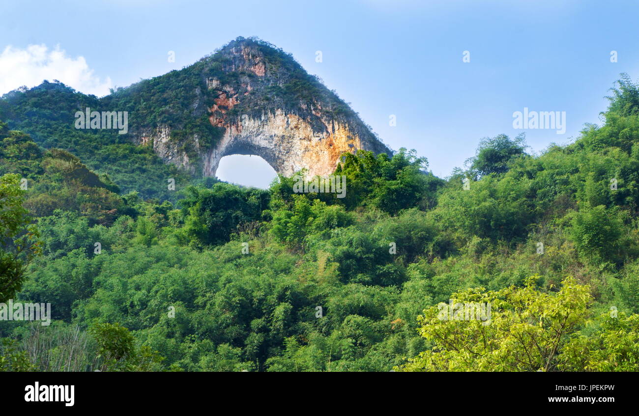 Moon shaped rock, a tourist attraction in Yangshuo, China Stock Photo ...