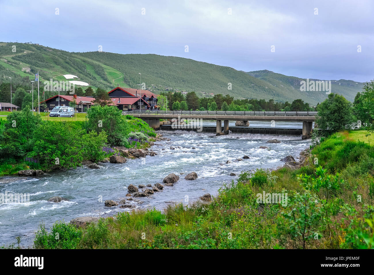 GEILO, NORWAY - JULY 19: Small river flowing through the city of Geilo ...