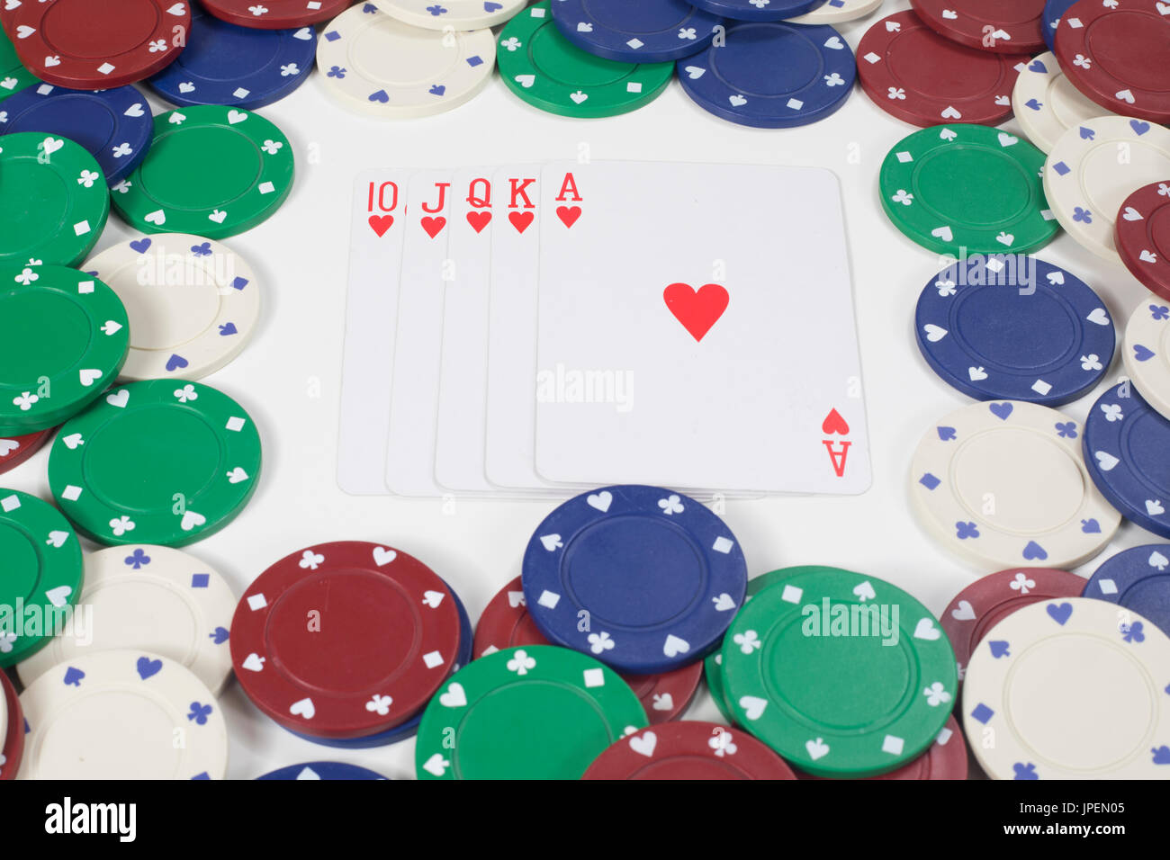 Set of winning playing cards surrounded by green, white, blue and red ...