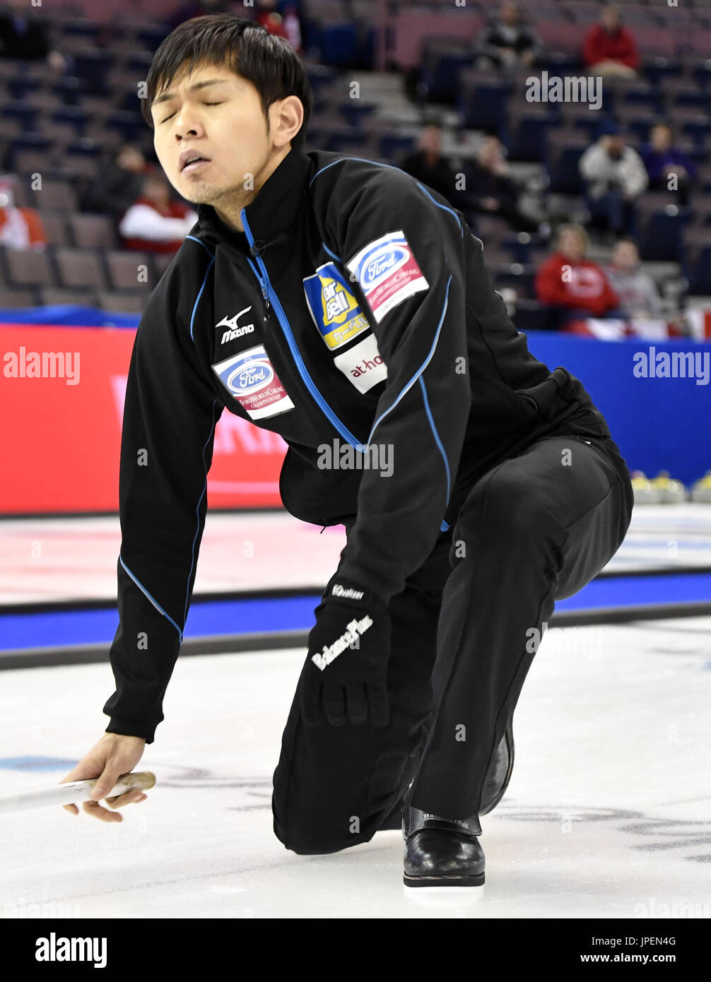 Japan skip Yusuke Morozumi looks downcast after making a shot during the seventh end of a world ...