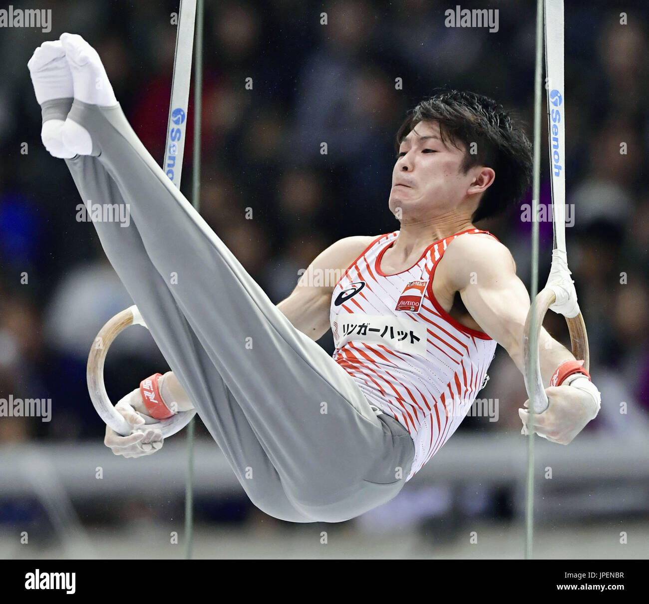 Kohei Uchimura performs on the rings en route to winning his 10th ...