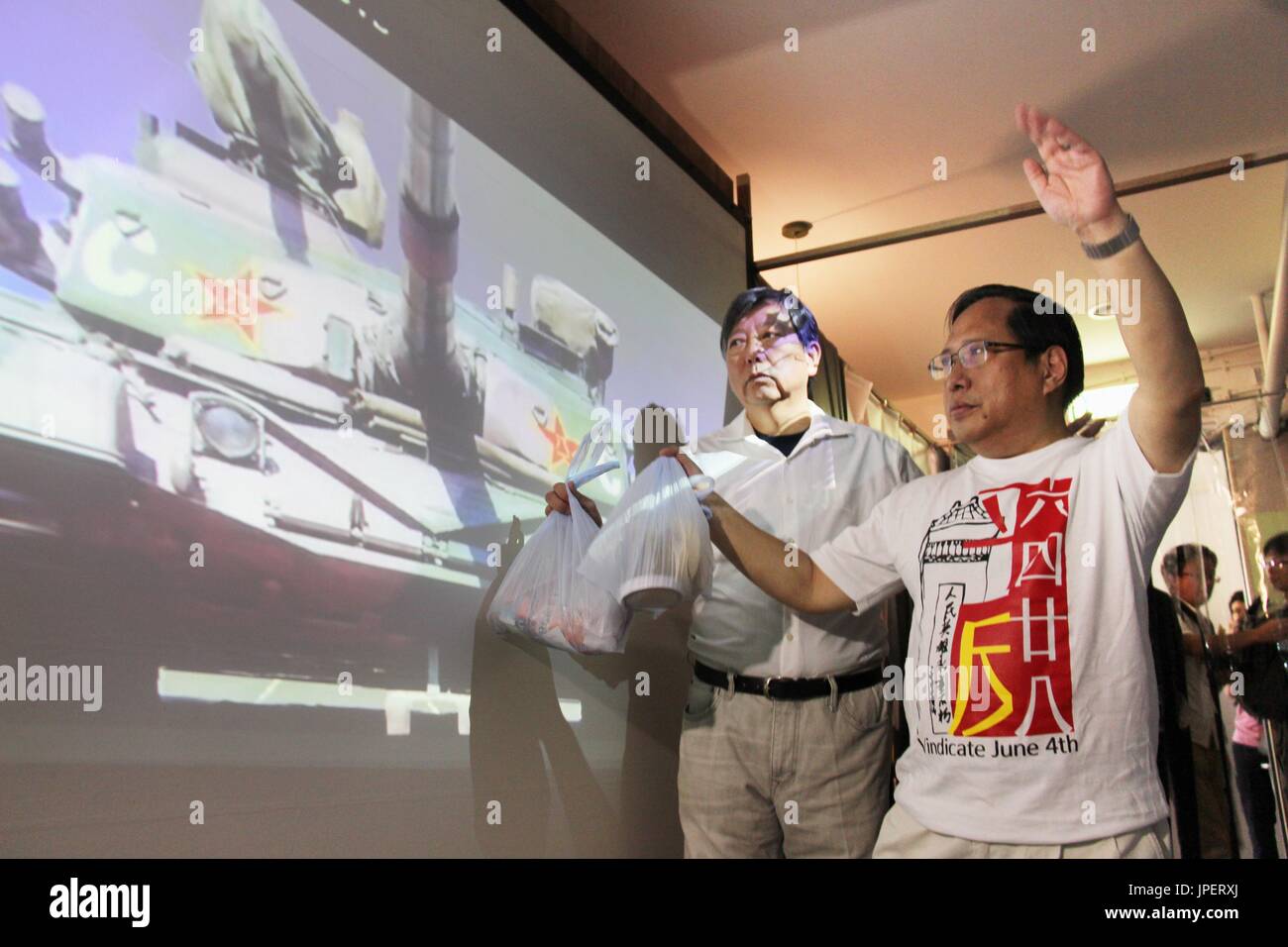 Albert Ho (R) of the Hong Kong Alliance in Support of Patriotic ...