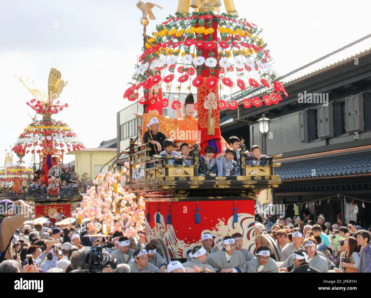 Decorated floats parade through the central Japan city of Takaoka on ...