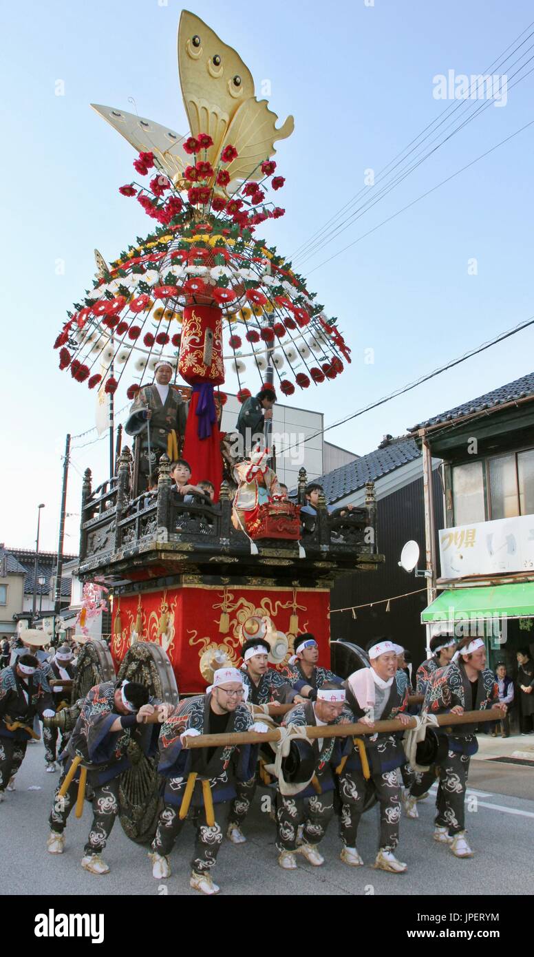 Decorated floats parade through the central Japan city of Takaoka on ...