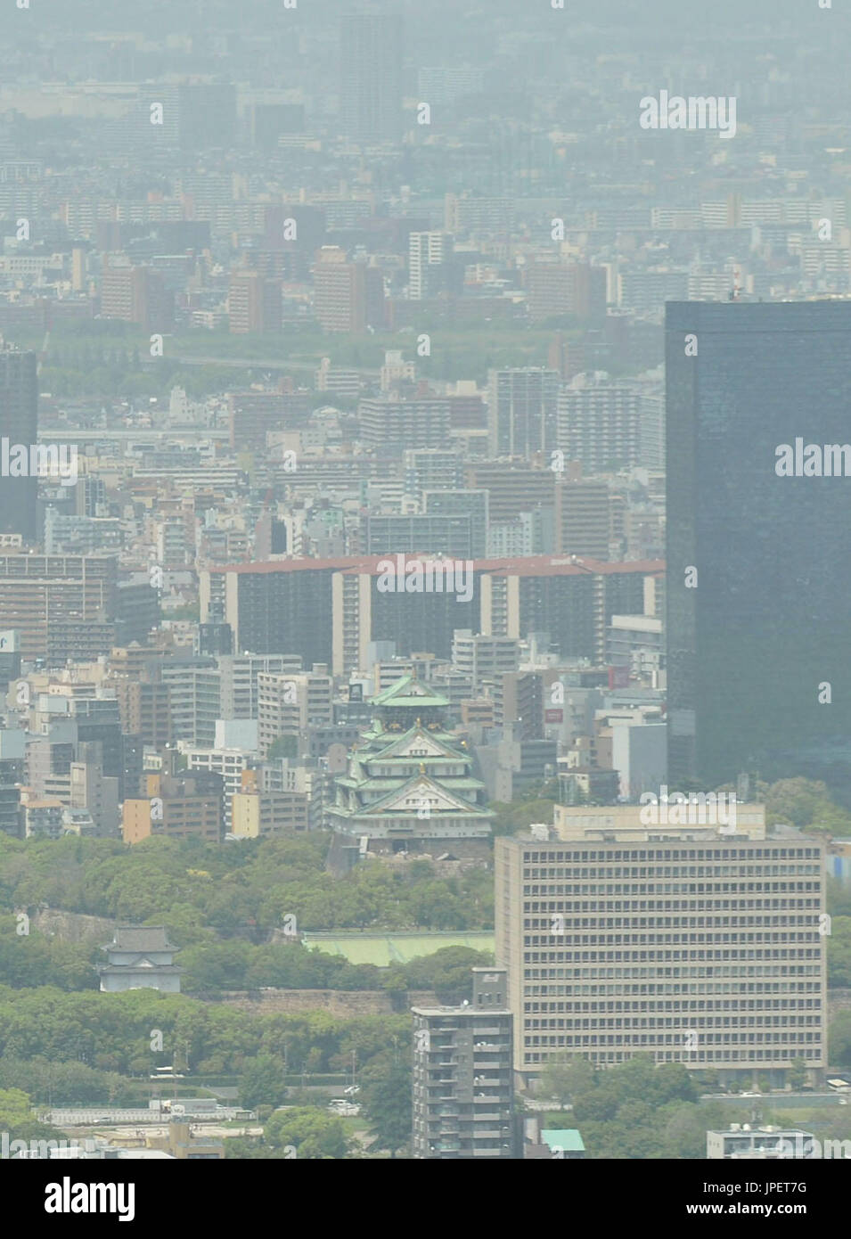The western Japan city of Osaka is shrouded in yellow sand on May 7 ...