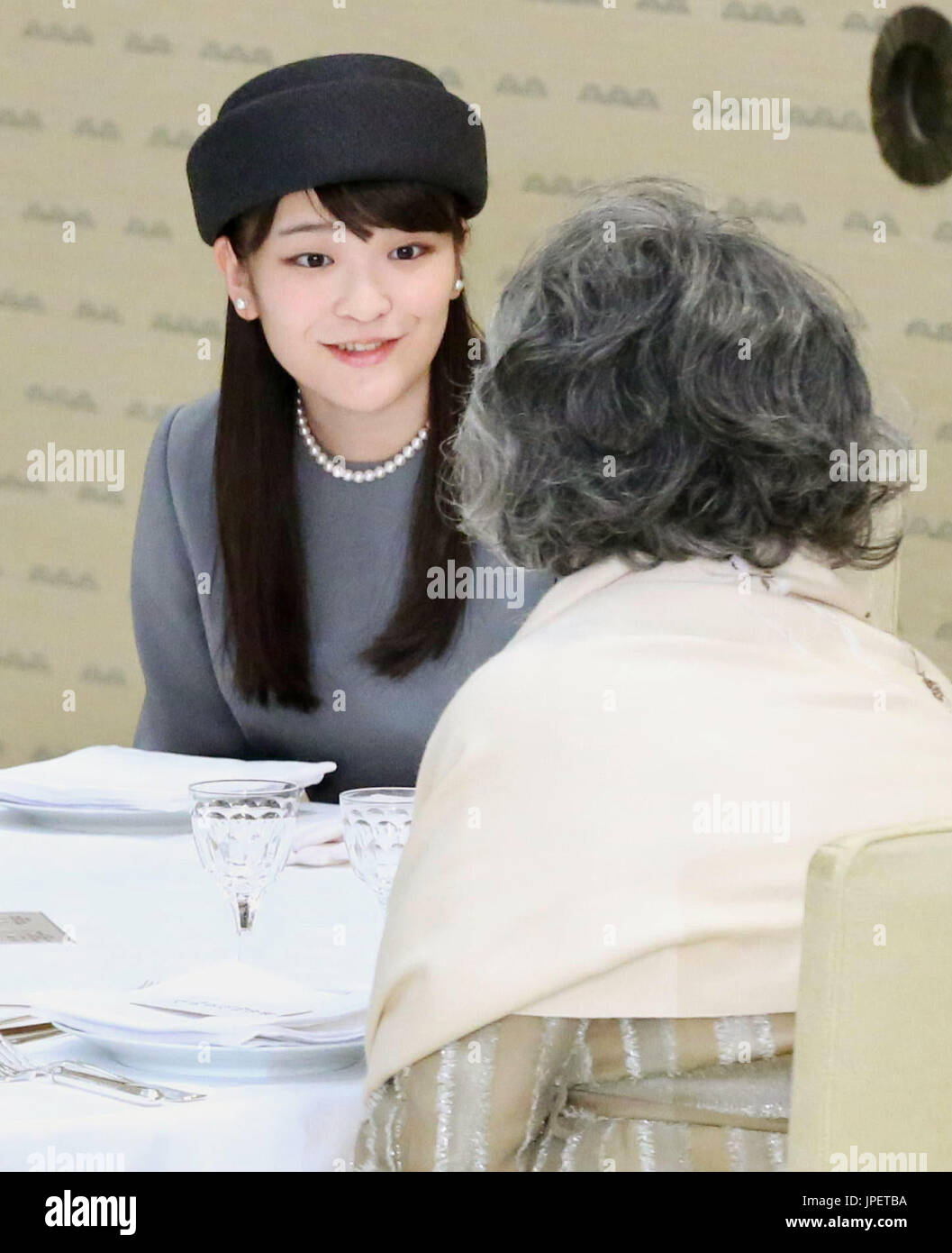 Princess Mako, a granddaughter of Emperor Akihito, talks with a ...