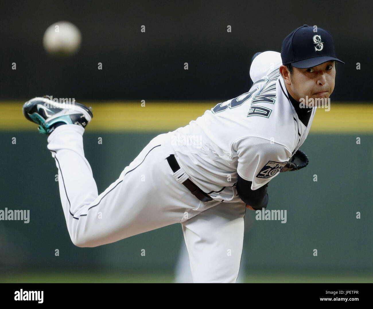 Hisashi Iwakuma of the Seattle Mariners pitches against the Los Angeles ...