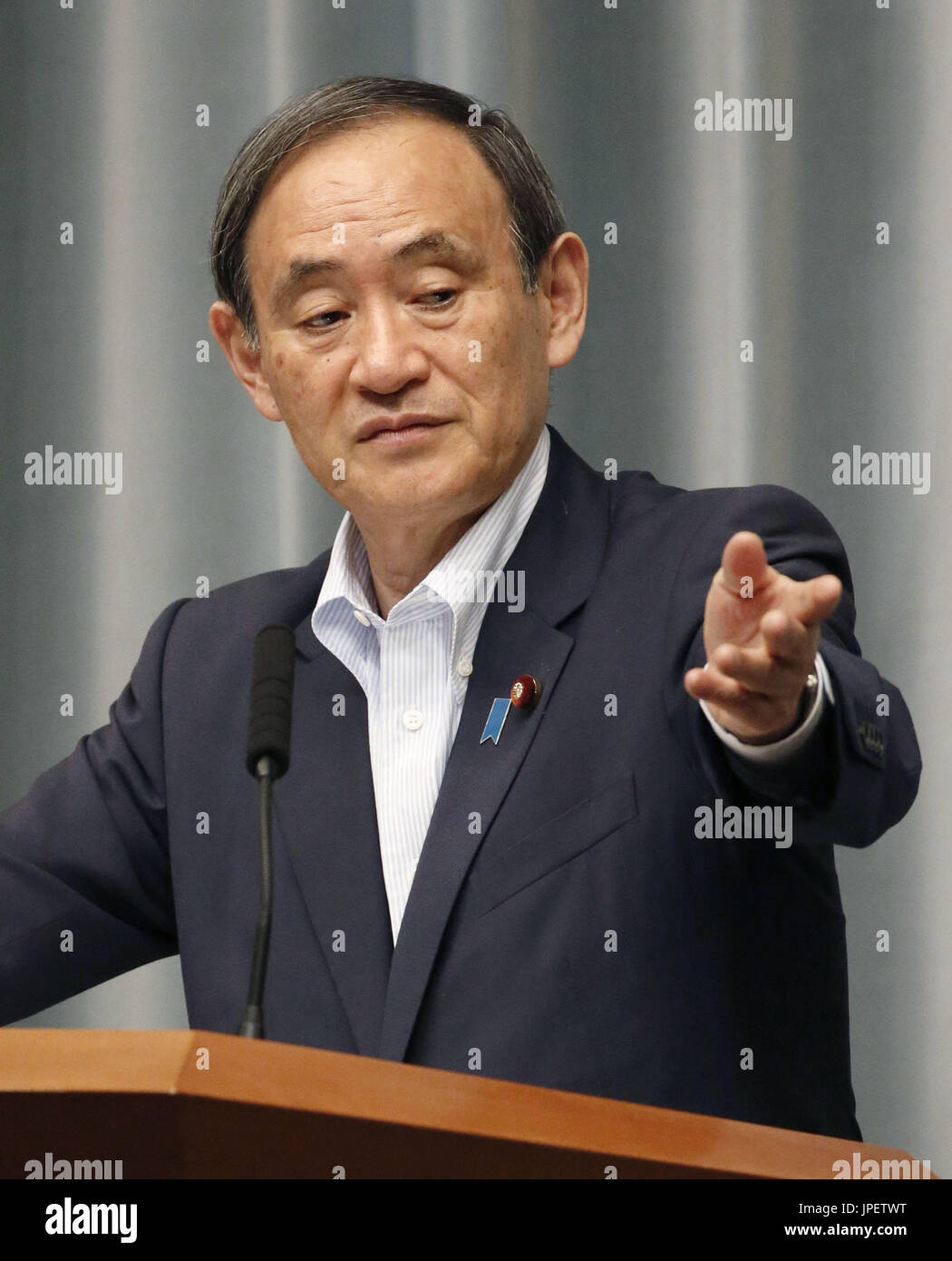 Japanese Chief Cabinet Secretary Yoshihide Suga holds a regular press ...