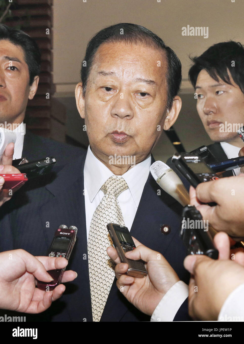 Toshihiro Nikai (C), secretary general of Japan's Liberal Democratic ...