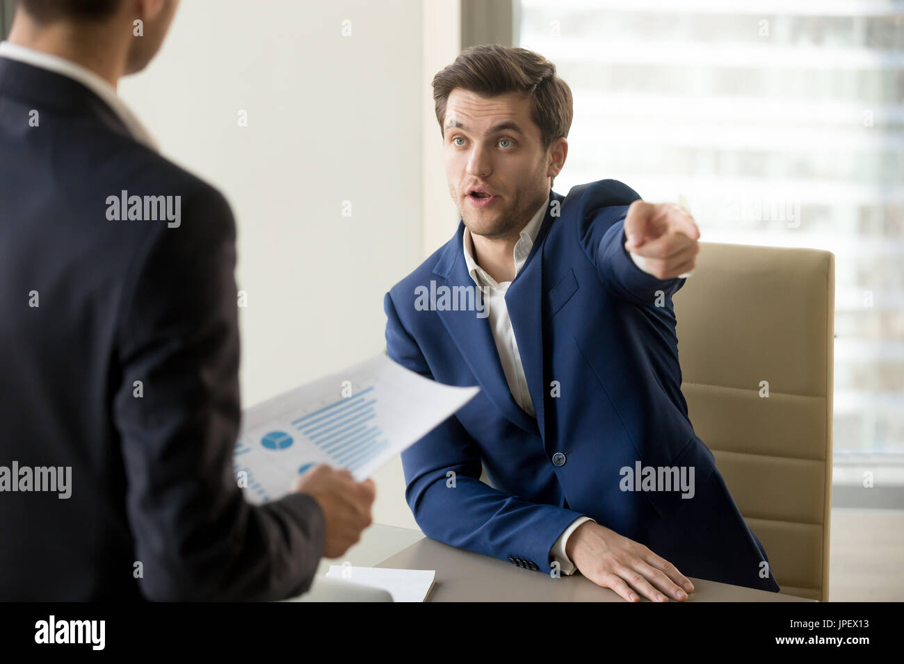 Boss yelling at employee hi-res stock photography and images - Alamy