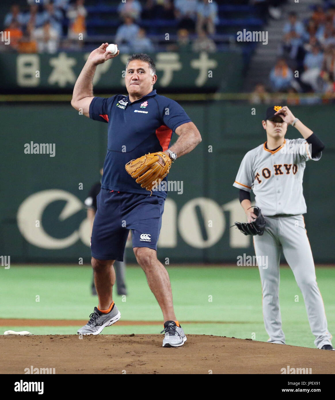 Jamie Joseph, the coach of the Japanese national rugby team, throws out ...