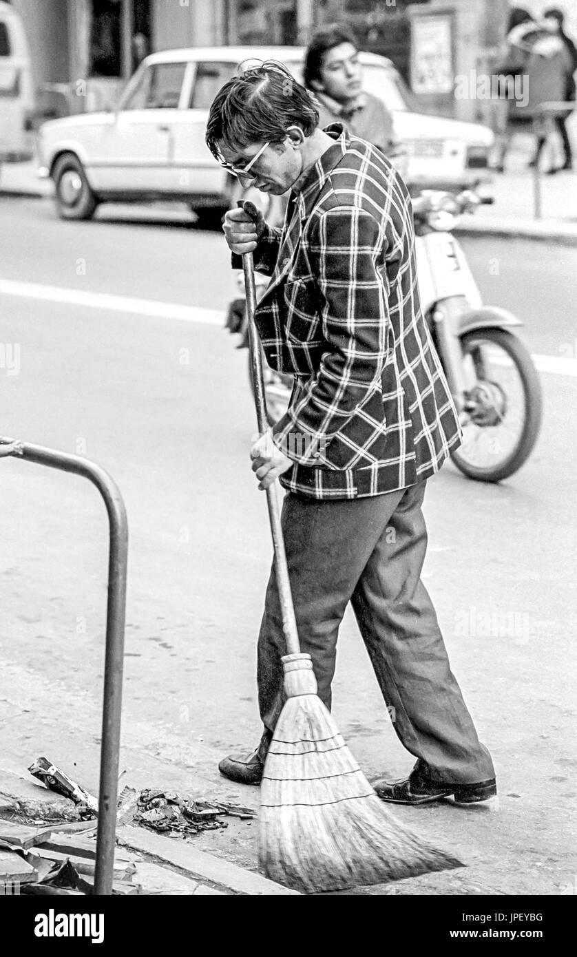 A men sweeping the street in Athens in 1986 Stock Photo - Alamy