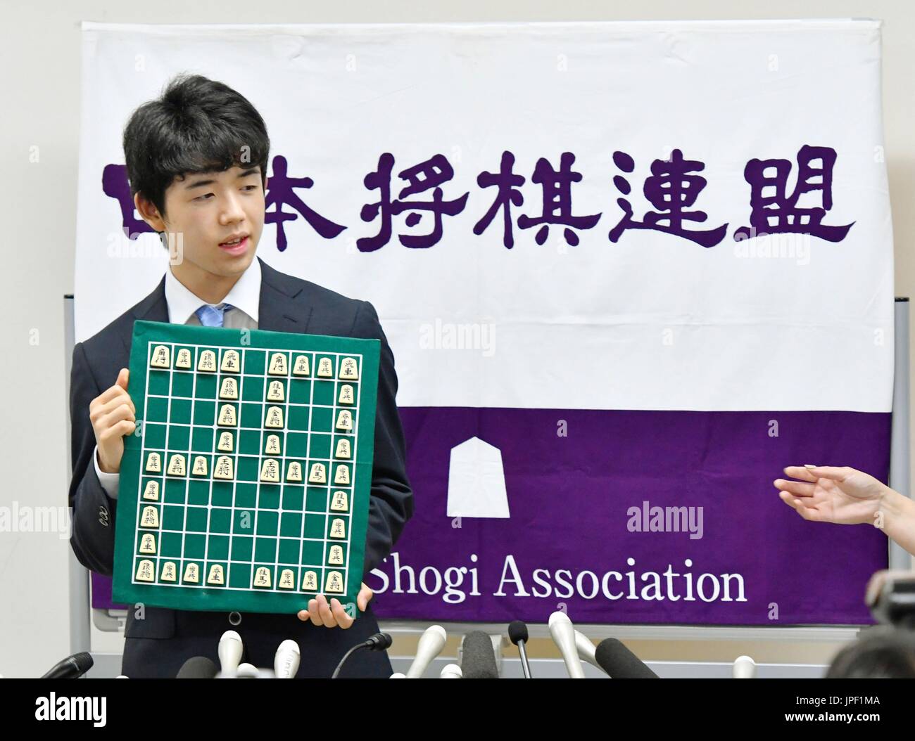 Japan's youngest professional shogi player, 14-year-old Sota Fujii ...