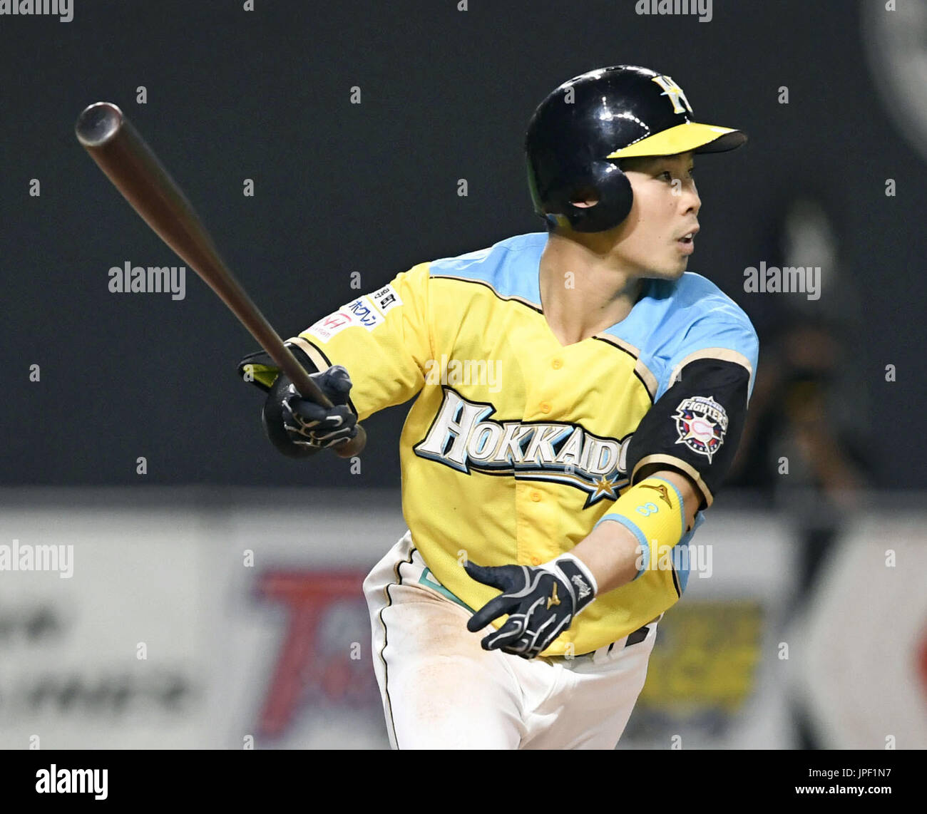 Kensuke Kondo hits an RBI double in the seventh inning of the Nippon ...