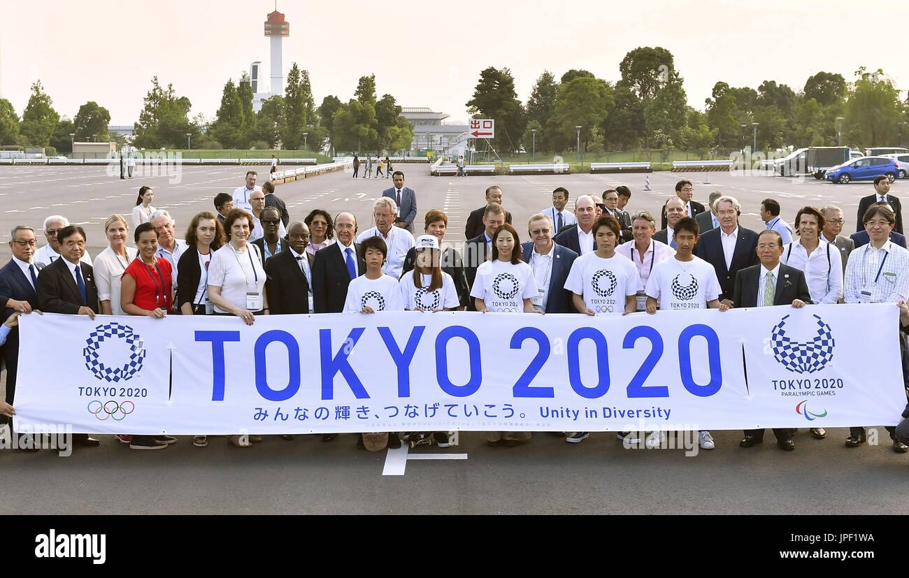 Members of the International Olympic Committee take a group photo at a ...