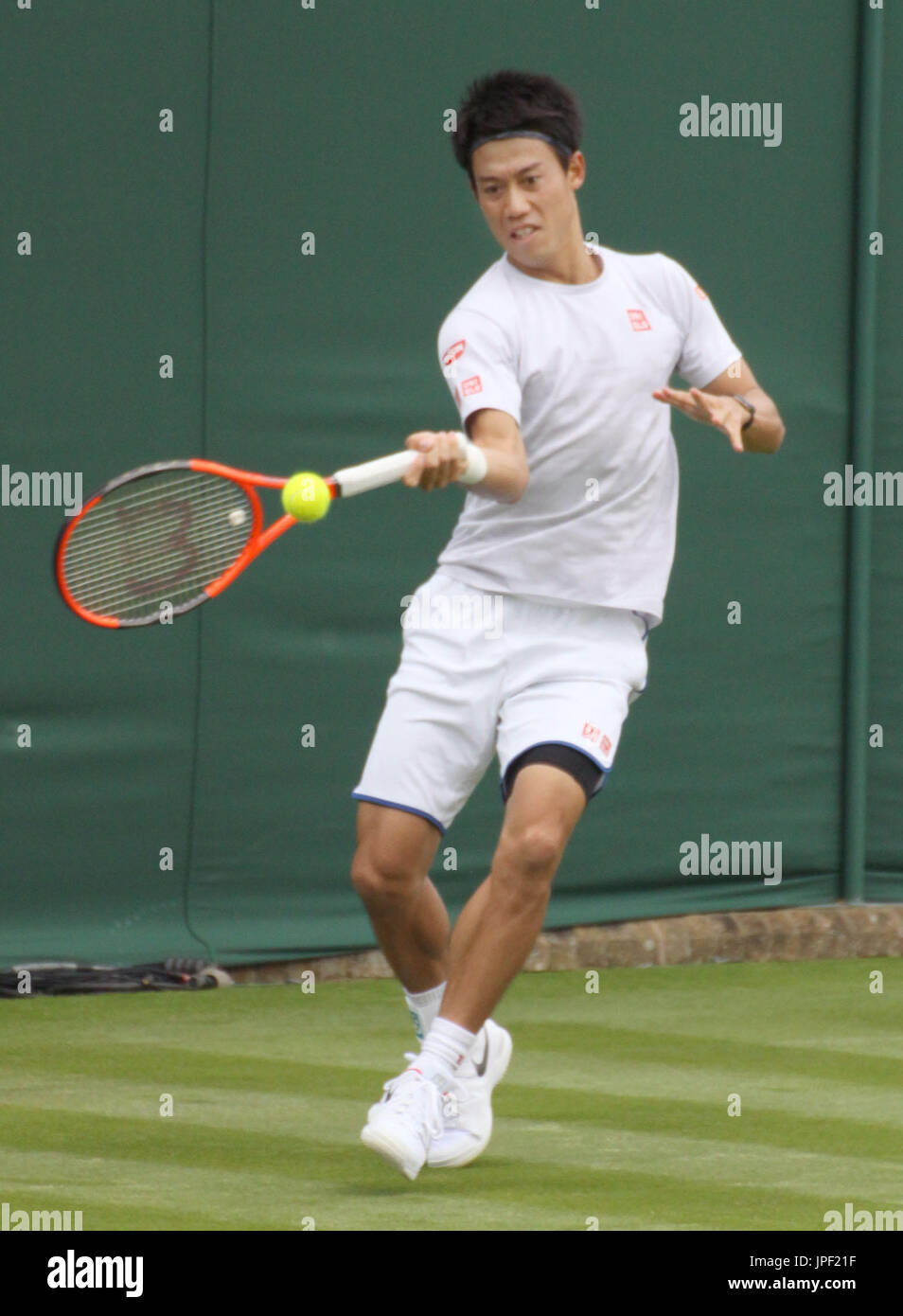 Japan's Kei Nishikori practices at the All England Club in Wimbledon ...