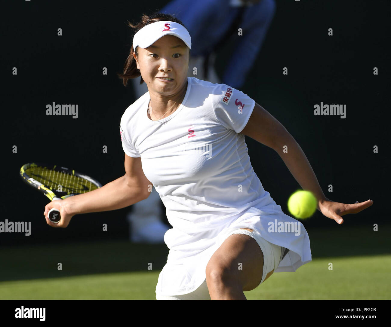 Japan's Kurumi Nara faces off against Francoise Abanda of Canada during a first round match at ...