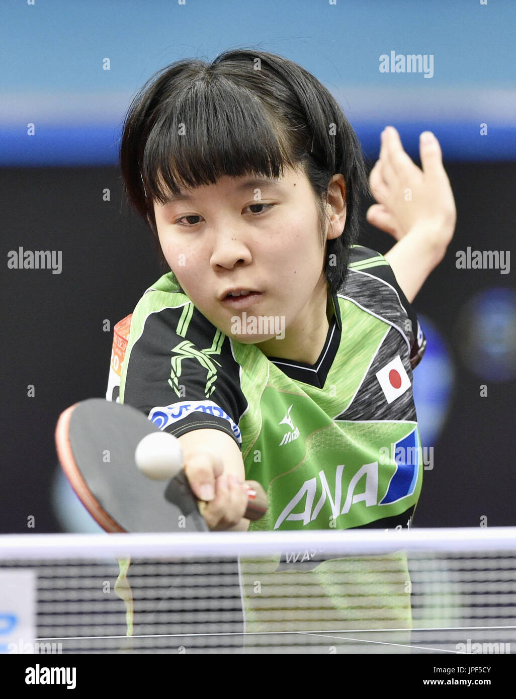 Miu Hirano of Japan plays against world No. 2 Zhu Yuling of China in ...