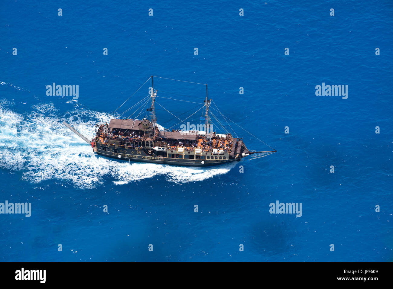Tourist "pirate" ship Menia-Maria 1 in the clear blue waters of ...