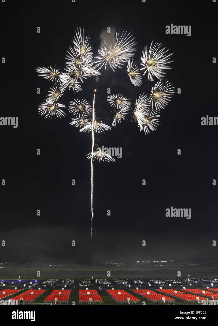Fireworks are shot into the air during the "Omagari Hanabi Spring ...