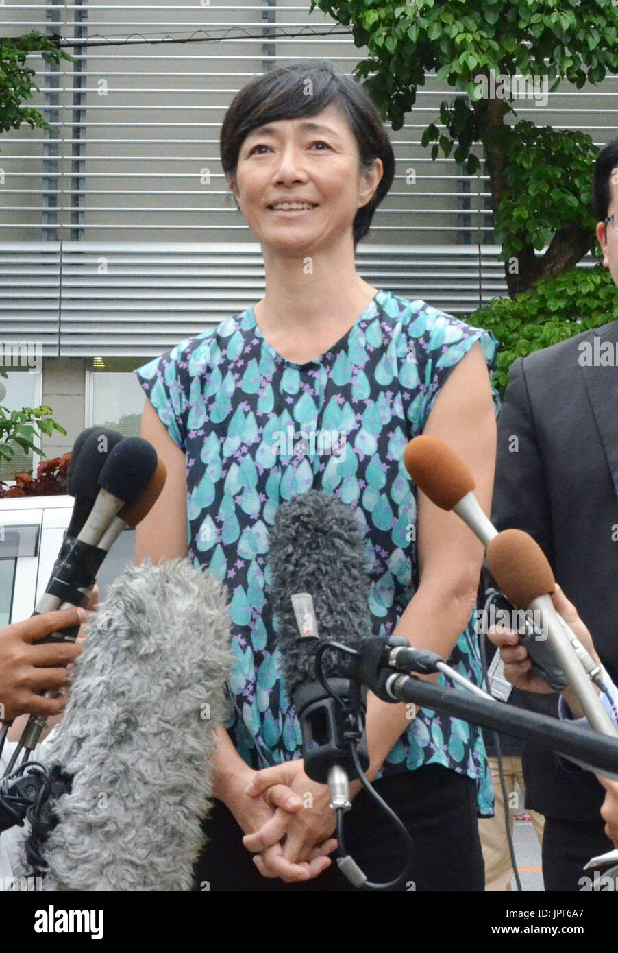 Former Japanese actress Saya Takagi meets with reporters in Naha on ...