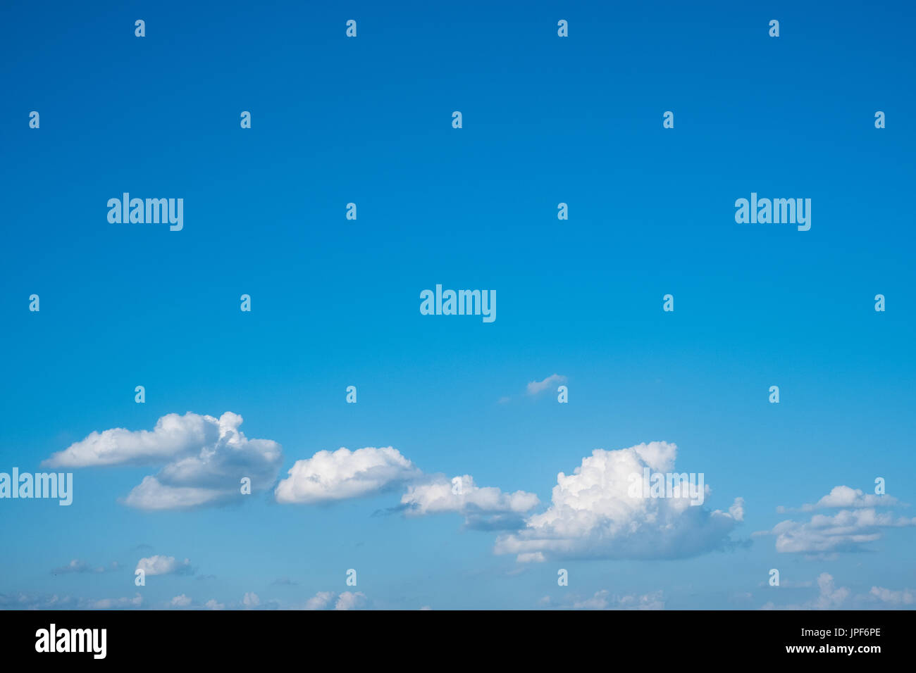 blue sky - clouds on blue sky background Stock Photo - Alamy