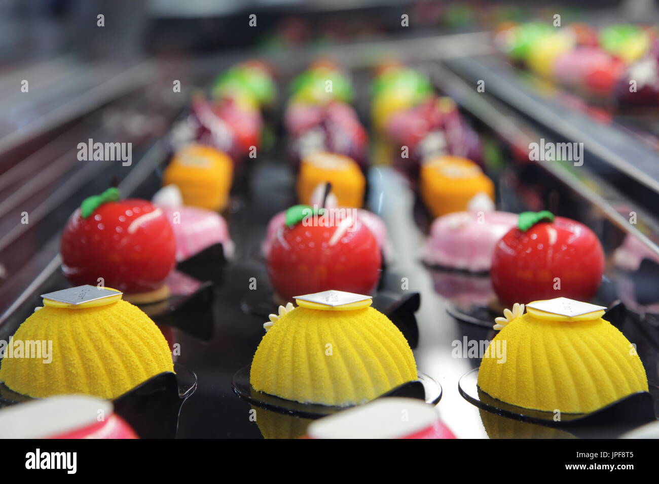 Colorful mousse cake shown in a freezer Stock Photo - Alamy