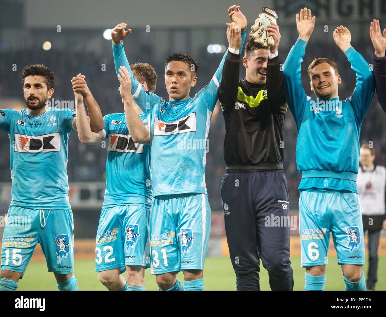 Gent players celebrate after a 5-2 win at home to Waregem in the ...