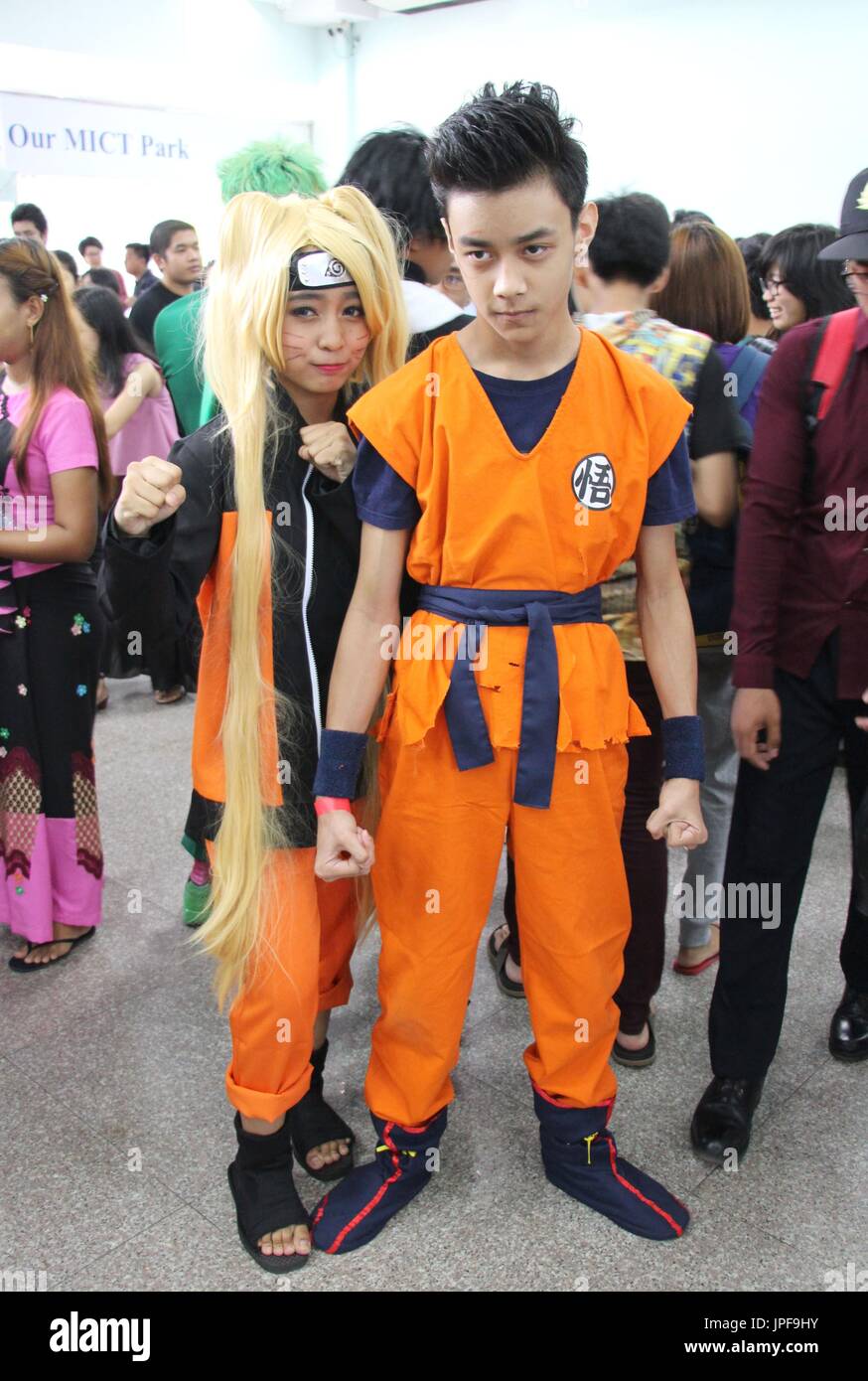 Myanmar youths dressed up as Japanese anime characters pose during a ...