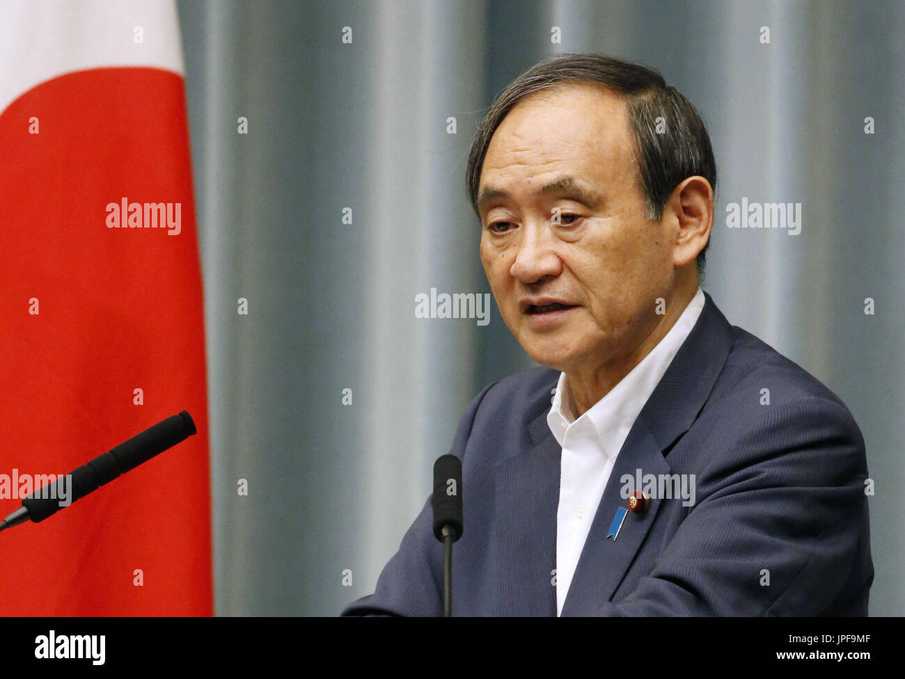 Japanese Chief Cabinet Secretary Yoshihide Suga speaks at a press ...