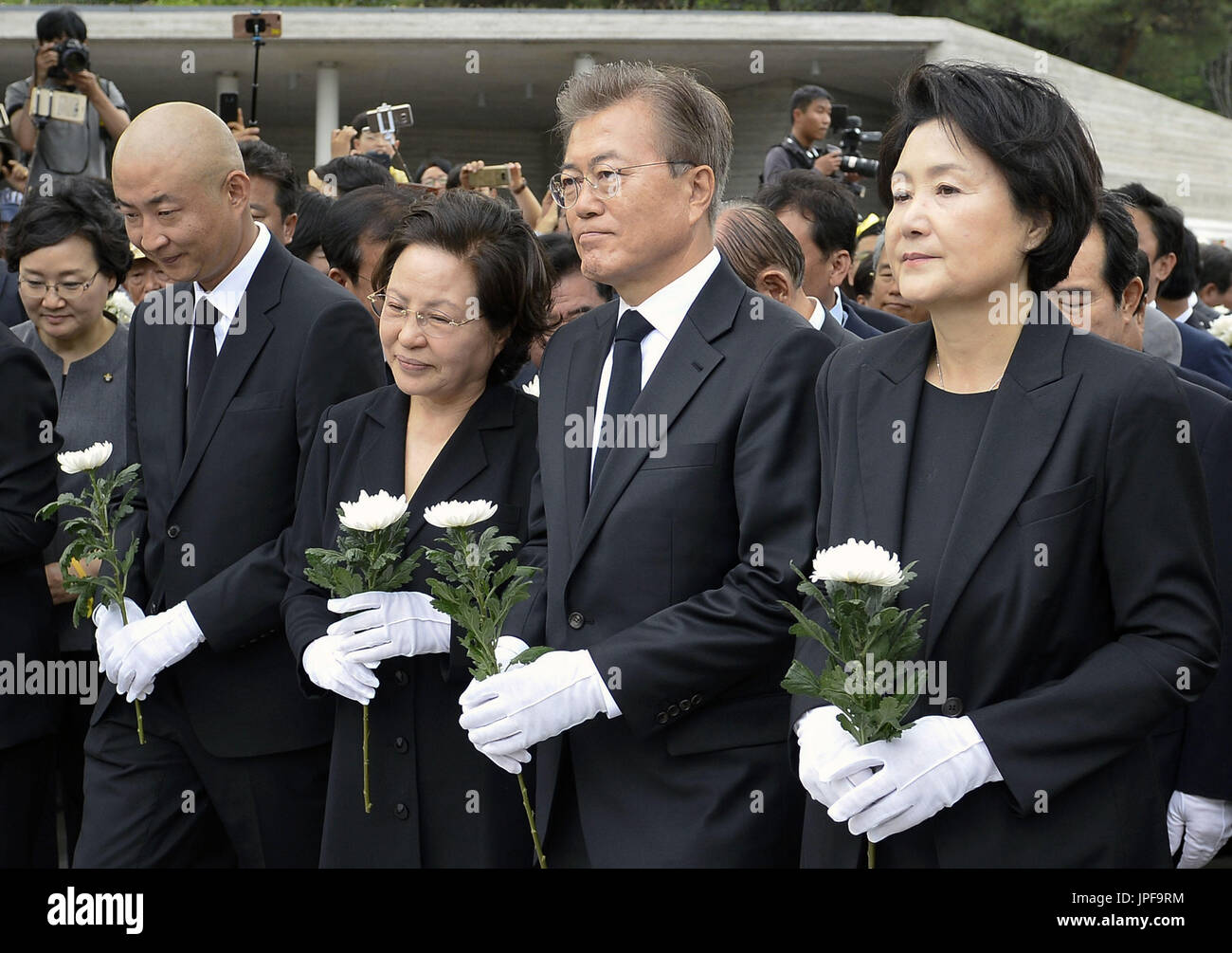 South Korean President Moon Jae In (2nd from R) attends a memorial ...